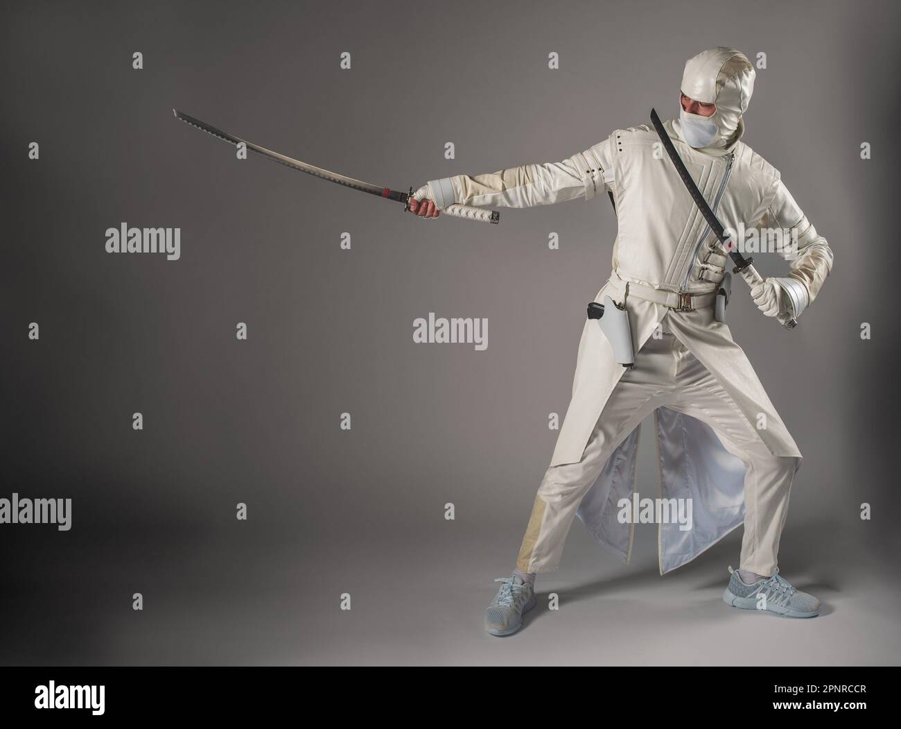Samurai fighting two swords hi-res stock photography and images - Alamy