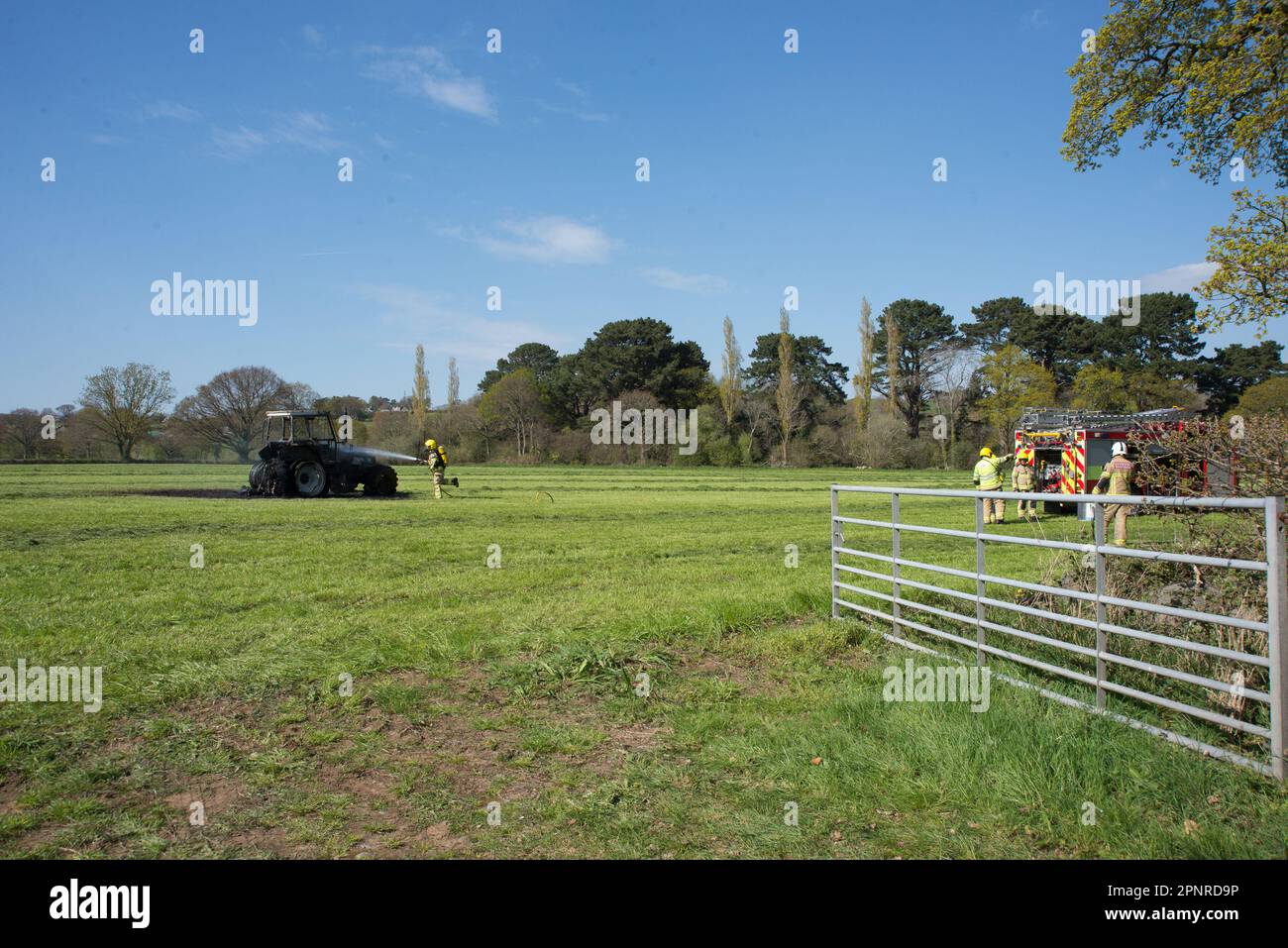 North Wales Fire and Rescue Service put out a Tractor Fire, Tal-Y-Cafn ...