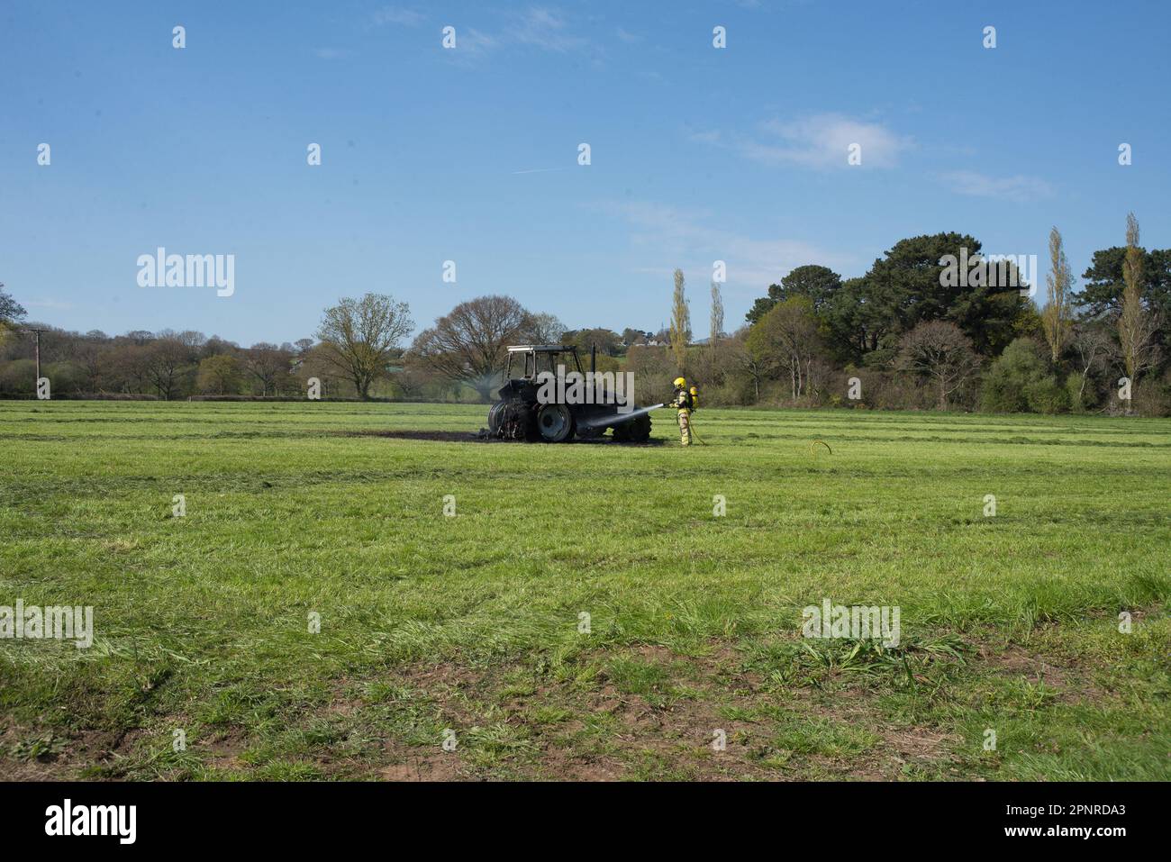North wales fire and rescue services put out a tractor hi-res stock ...