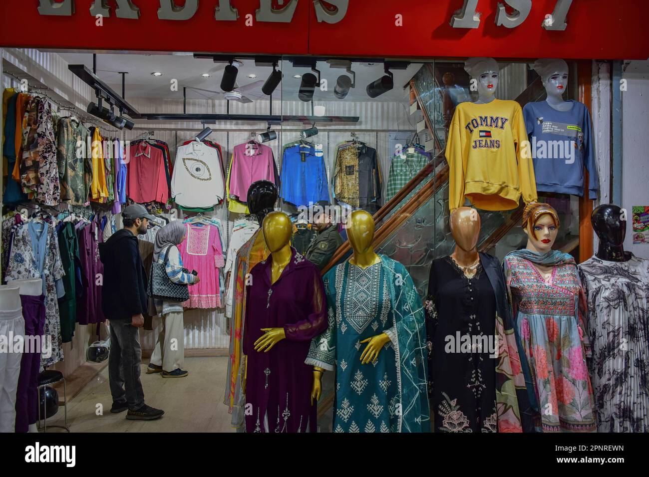 Kashmiri Muslims shop for clothes ahead of the Muslim festival Eid al ...