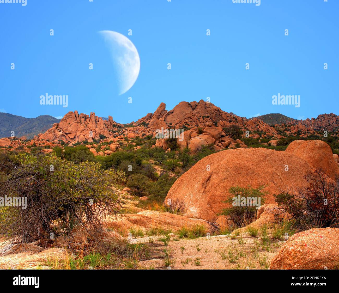 Large moon above Texas Canyon in Southeast Arizona Stock Photo - Alamy