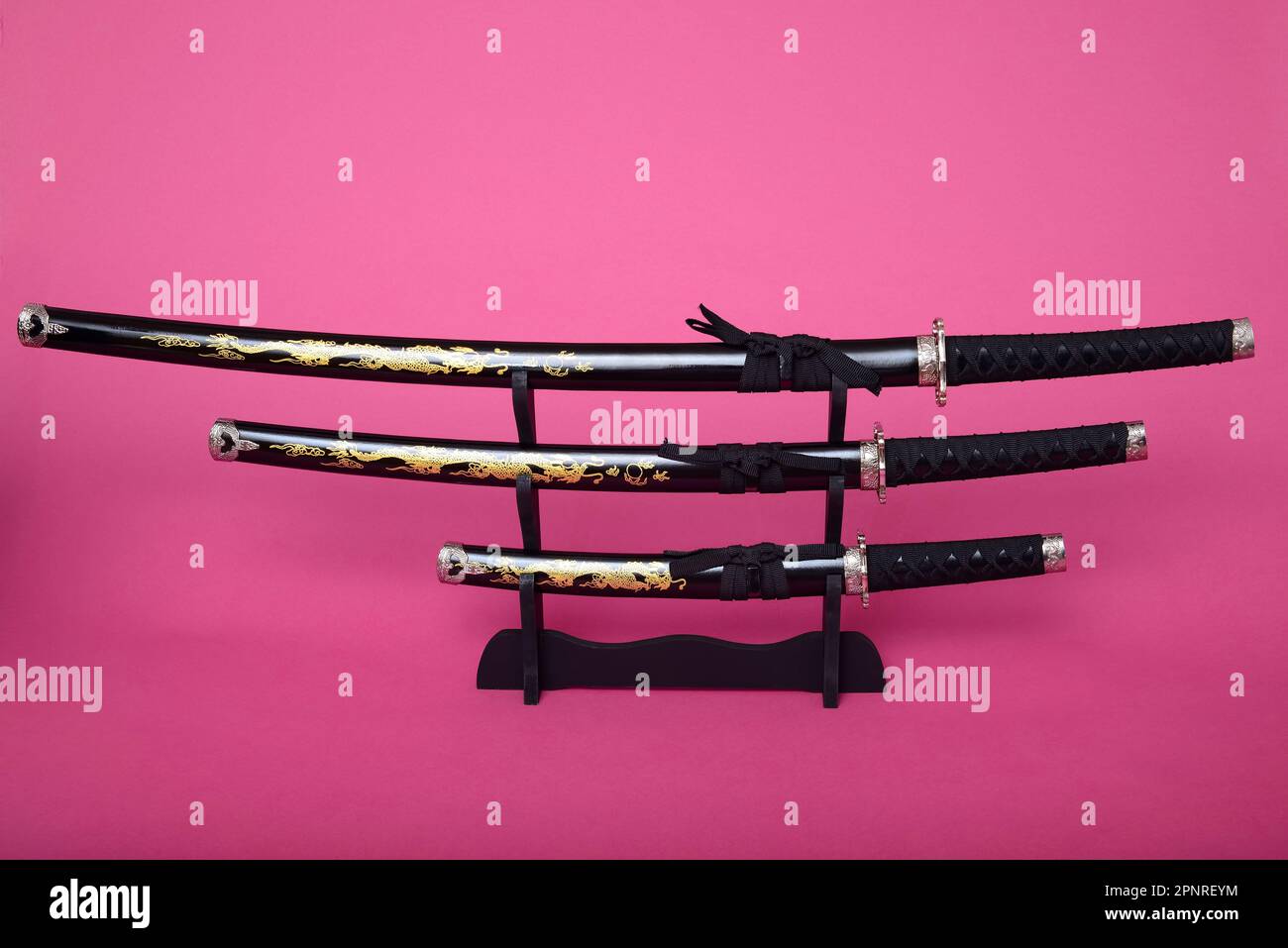 Samurai swords guard, and hilt isolated over pink Stock Photo - Alamy