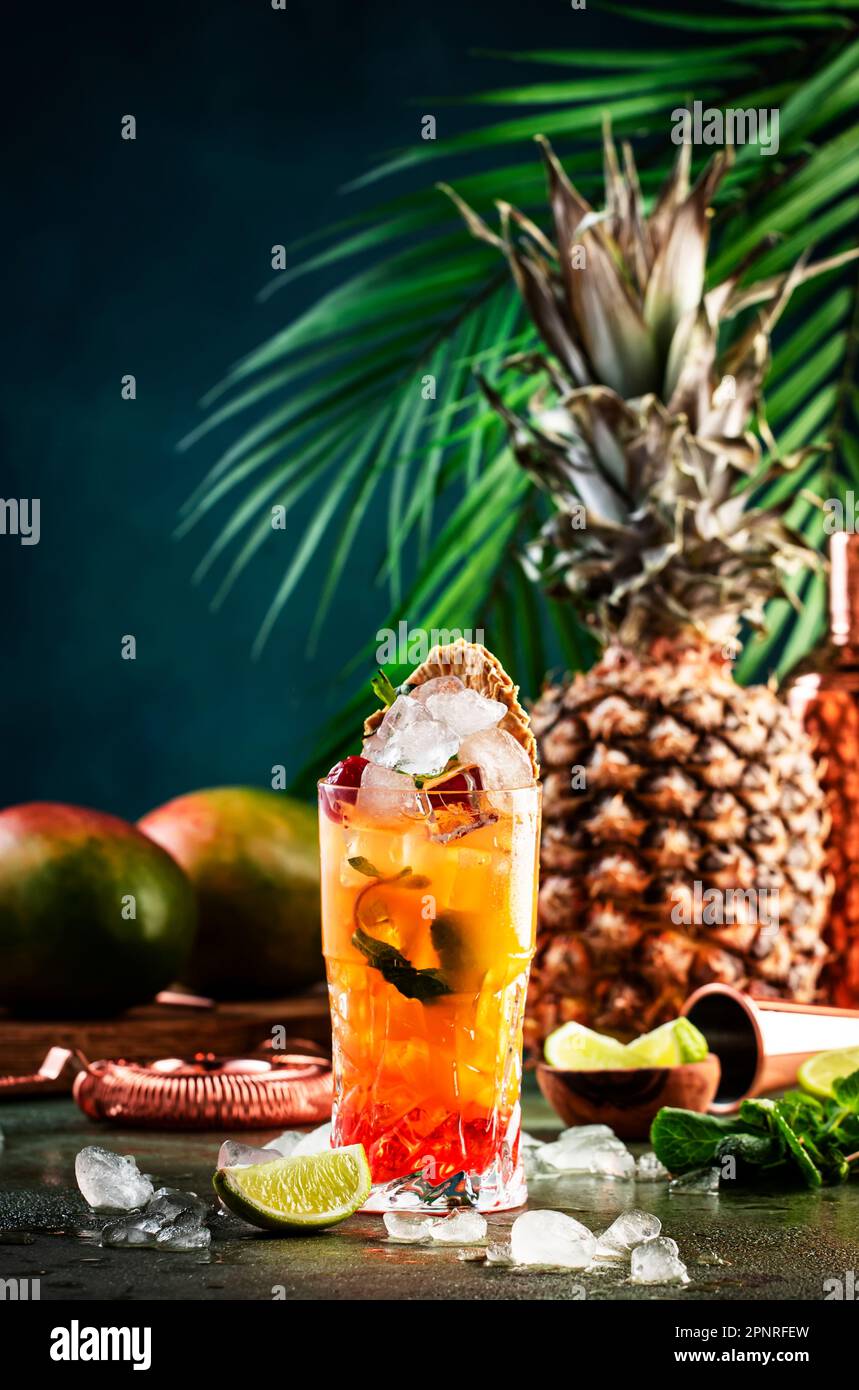 Alcoholic cocktail with vodka, pineapple juice, mango, liquor, ice ...
