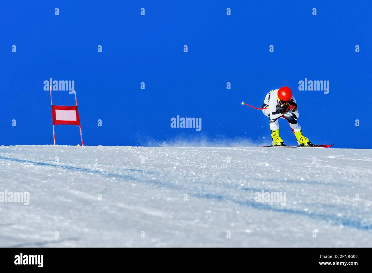 ski racer on alpine skiing track downhill, red gate and snowy slope on ...