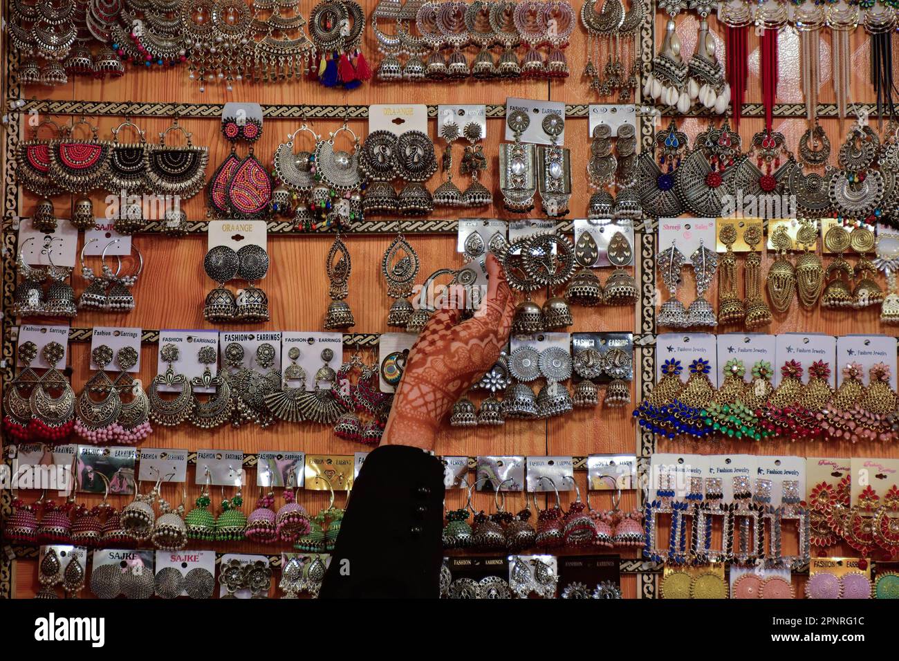 Srinagar, Kashmir, India. 20th Apr, 2023. A Kashmiri Muslim woman shops ...