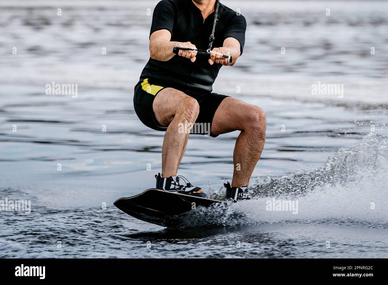 wakesurfing extreme summer water sports Stock Photo - Alamy