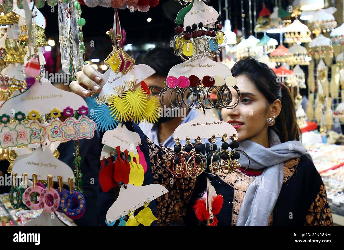 People are busy in Eid shopping ahead of the Eid-ul- Fitar during the ...