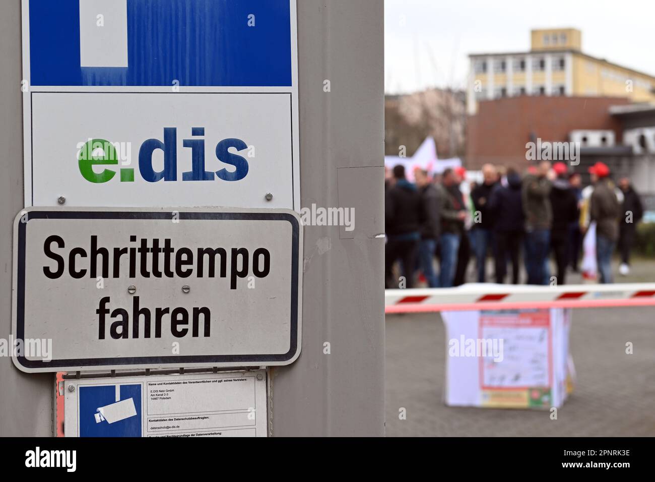 Potsdam, Germany. 20th Apr, 2023. Strikers stand in a company parking ...