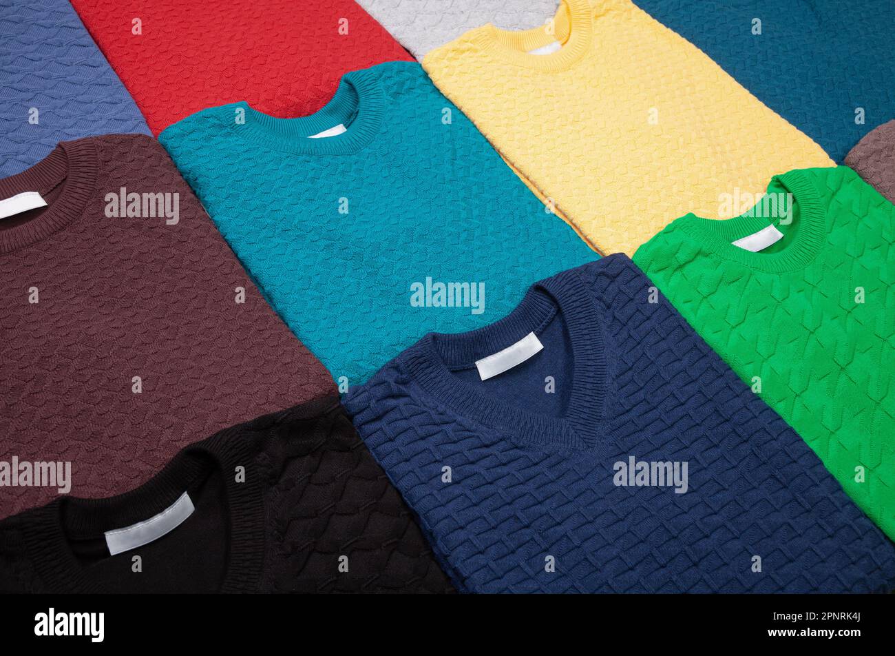 Folded jumper hi-res stock photography and images - Alamy