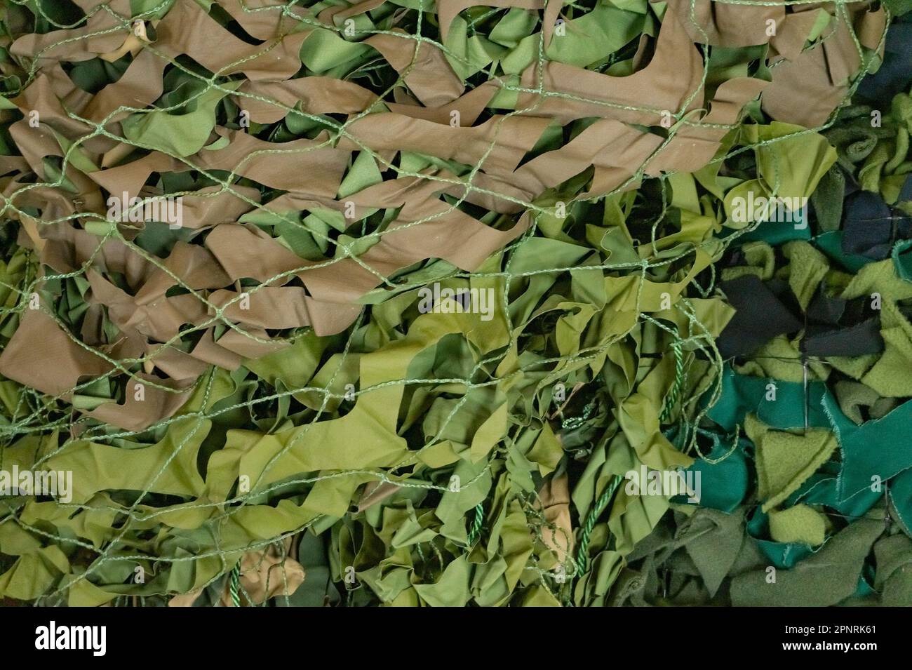 Homemade camouflage nets made from scraps of fabric to help the ...