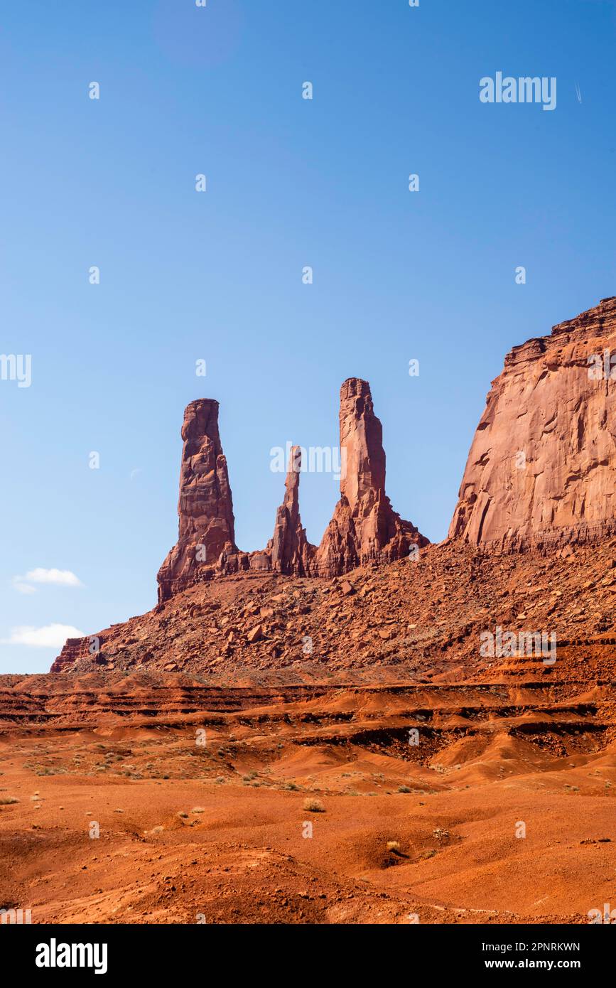 The Three Sisters, a rock spire formation in Monument Valley Tribal ...