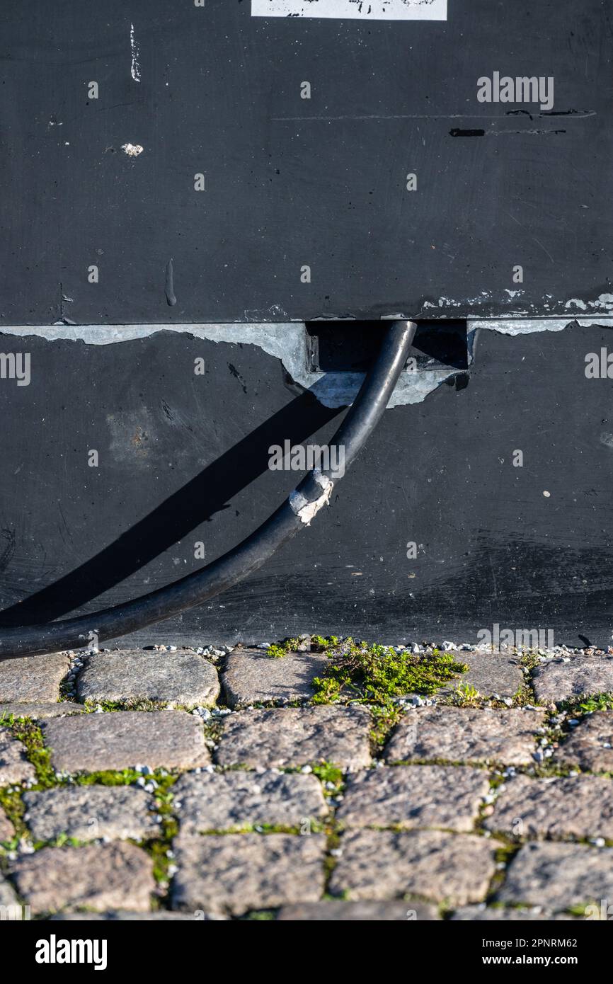 Improvised power cable sticking out of a junction box Stock Photo - Alamy