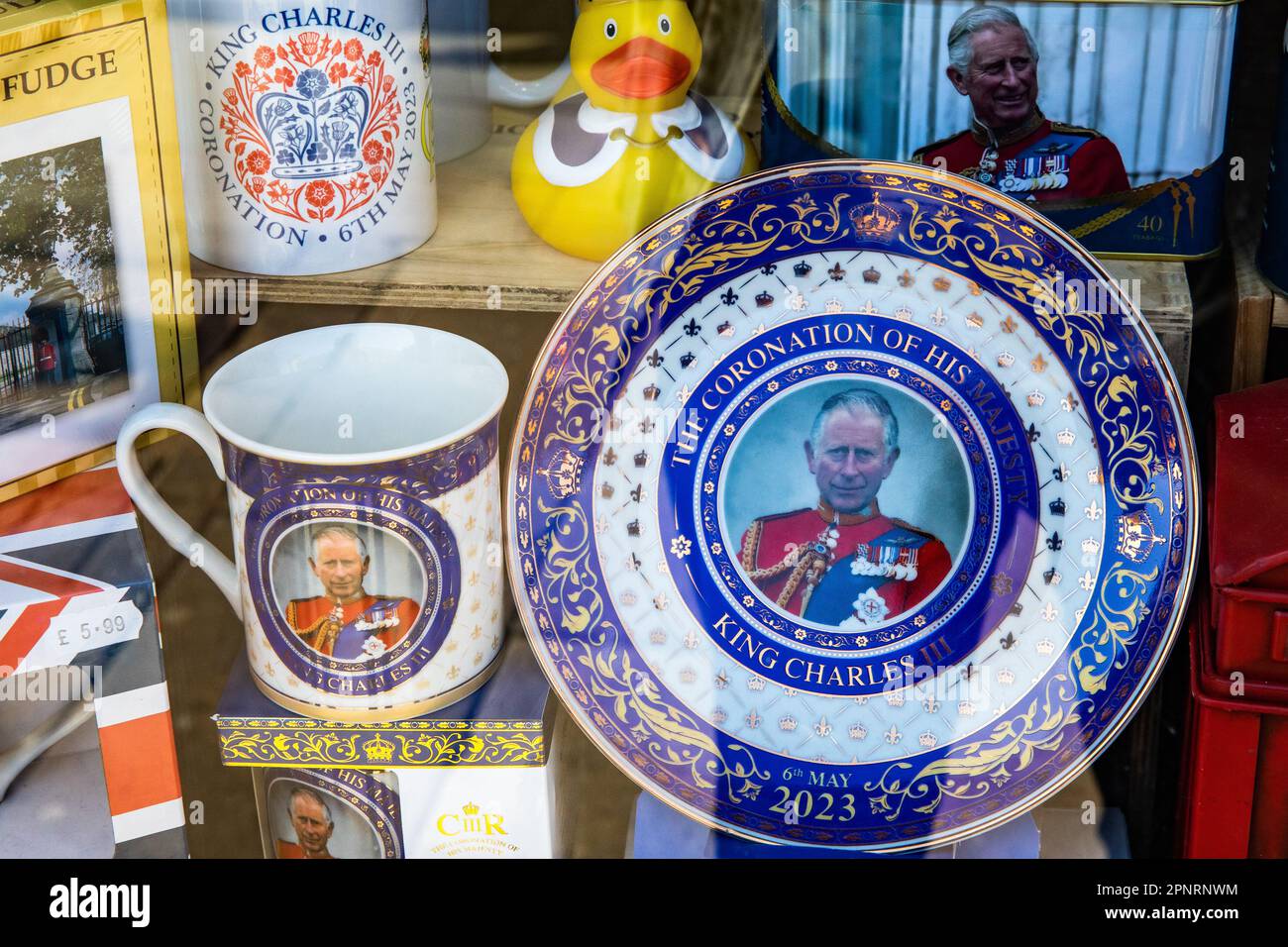 Windsor, UK. 20th April, 2023. Coronation souvenirs featuring images of ...