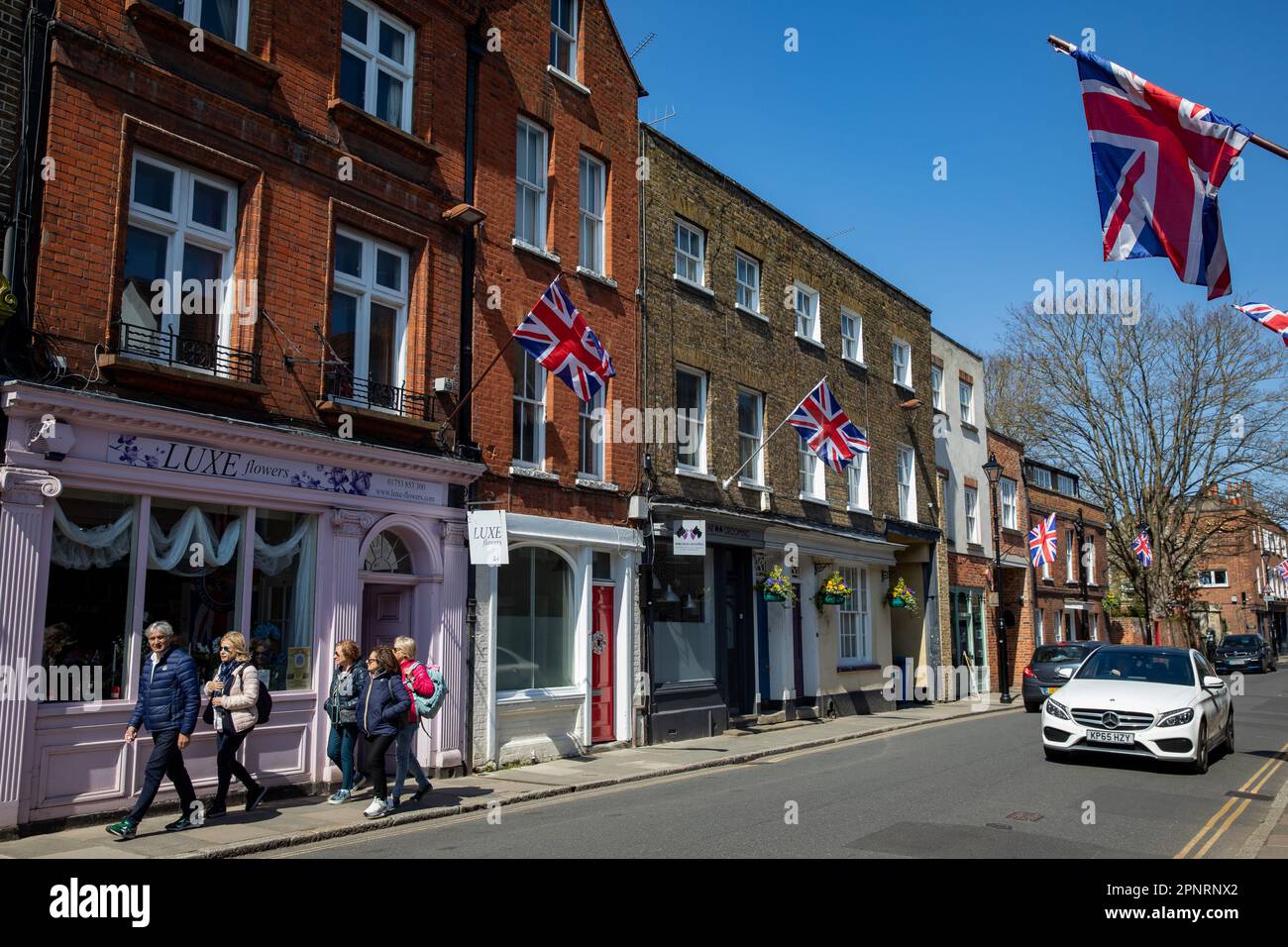 Eton, UK. 20th April, 2023. Union flags are pictured in Eton High ...