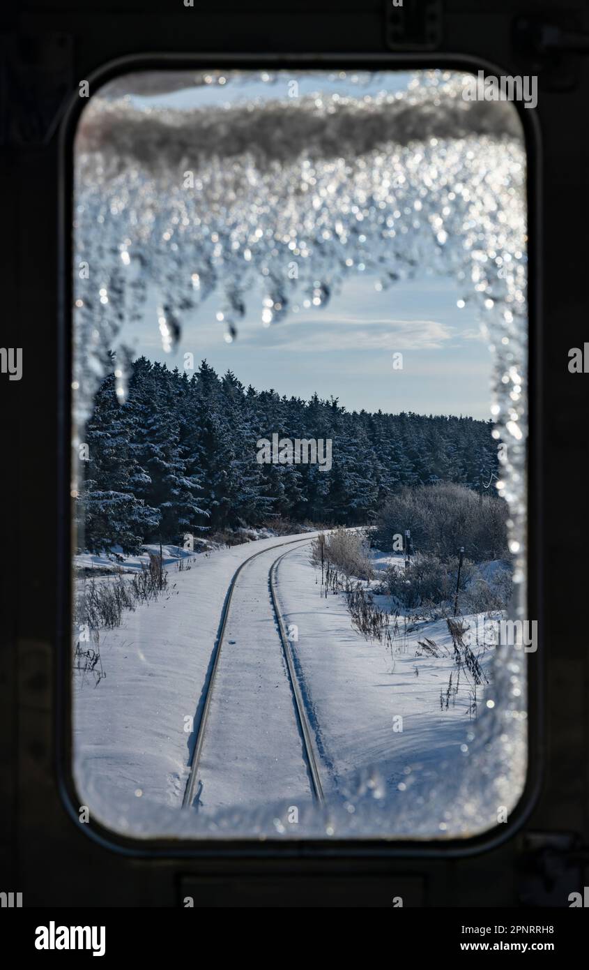 View through the front window of a JR Hokkaido train on the Senmo (or ...