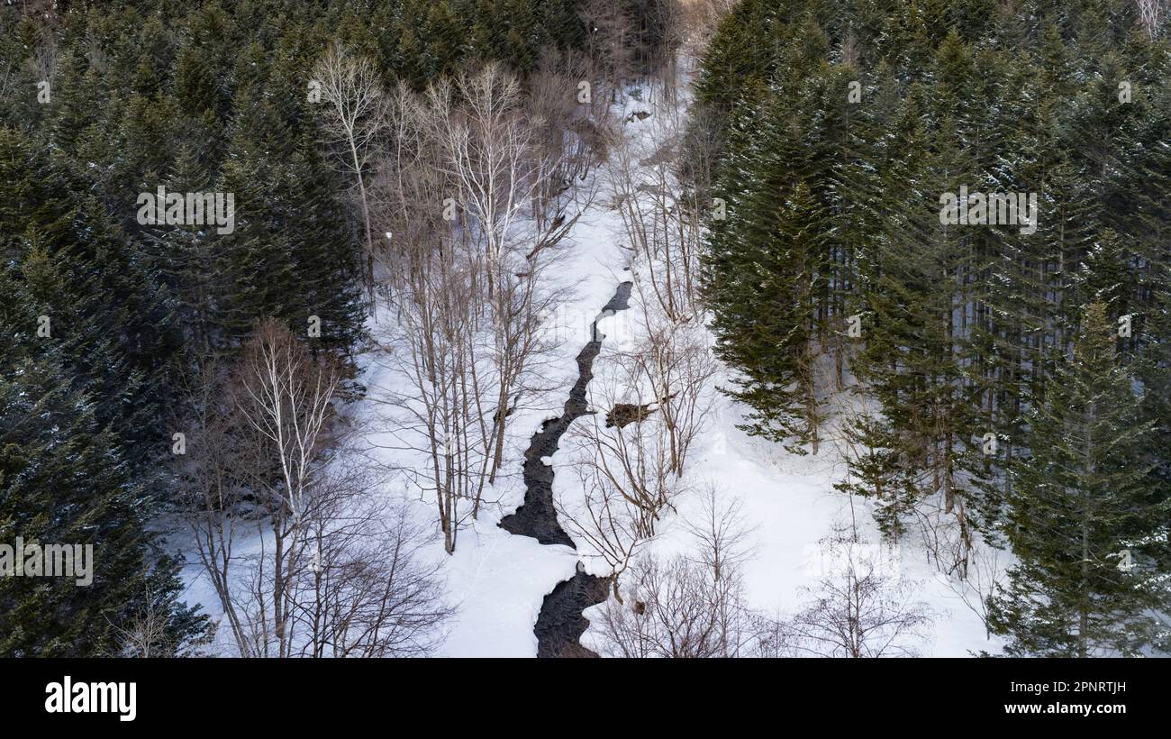 The Hobetsu River in winter seen from a JR Hokkaido Ozora express train ...
