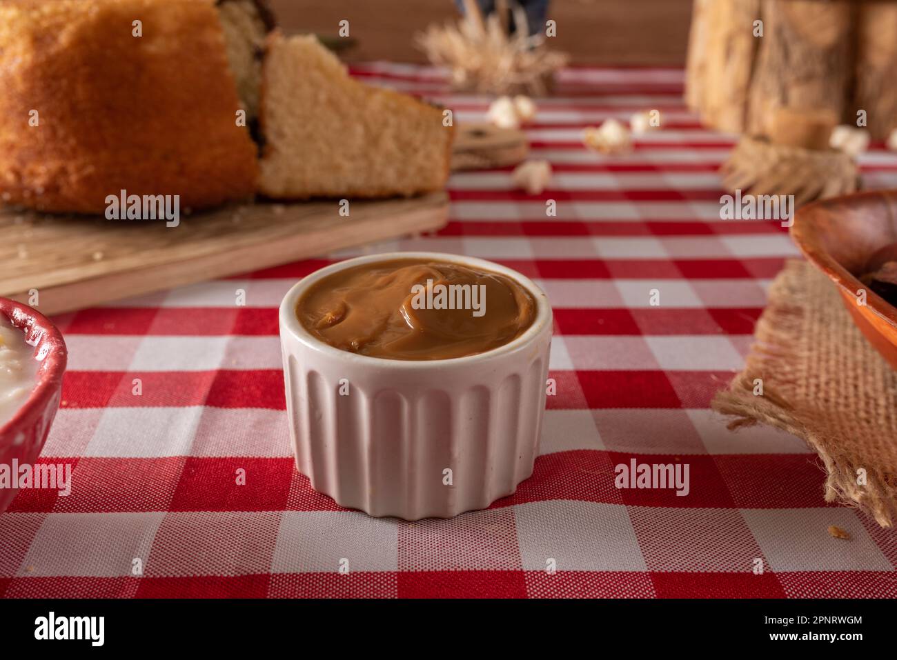 Table of brazilian festa junina. Milk cream Stock Photo - Alamy