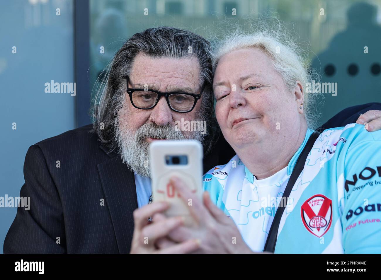 Ricky Tomlinson has a selfie with a Saints fan during the Betfred Super ...