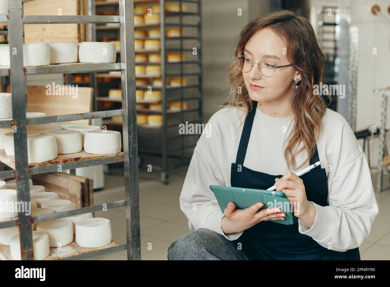 Young Farm Female Owner Controls Maturing Process of Goat Cheese Heads ...