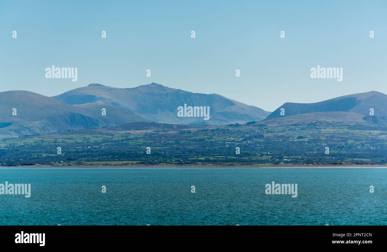 Mount Snowdon in the background of this image taken from Anglesey ...