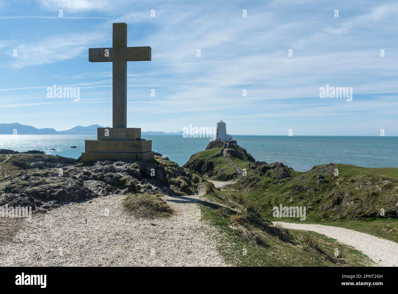 St Dwynwen's cross in the foreground with Twr Mawr lighthouse in view ...