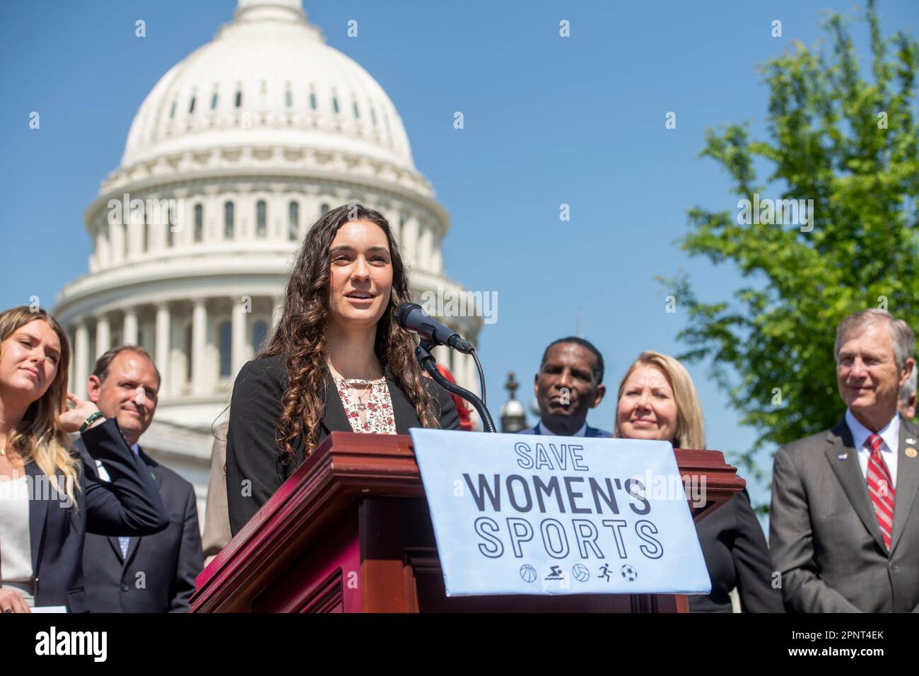 Taylor Silverman, a competitive skateboarder, offers remarks during a ...