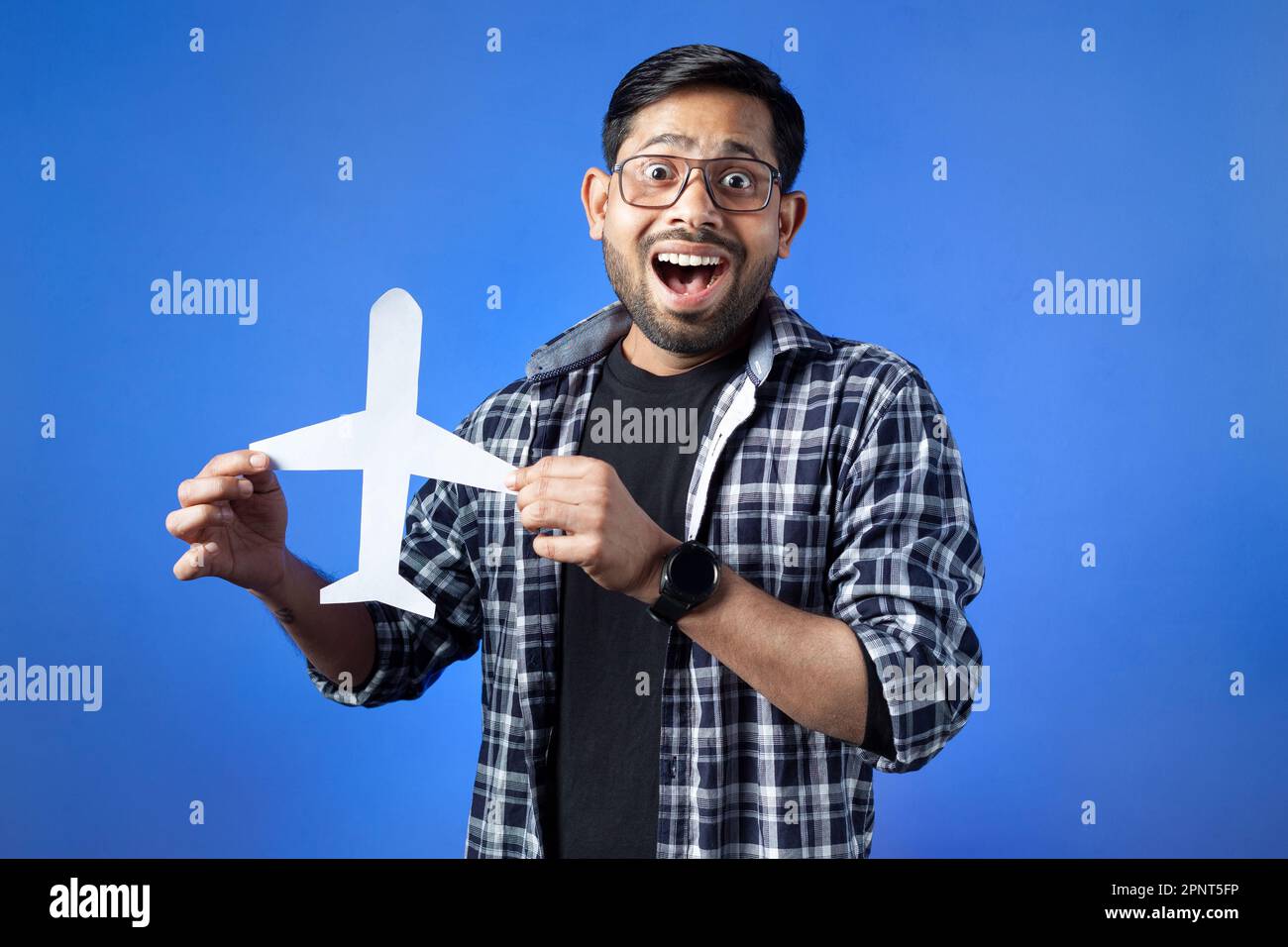 Portrait, tourist, airplane, airport. Surprised shocking man showing ...
