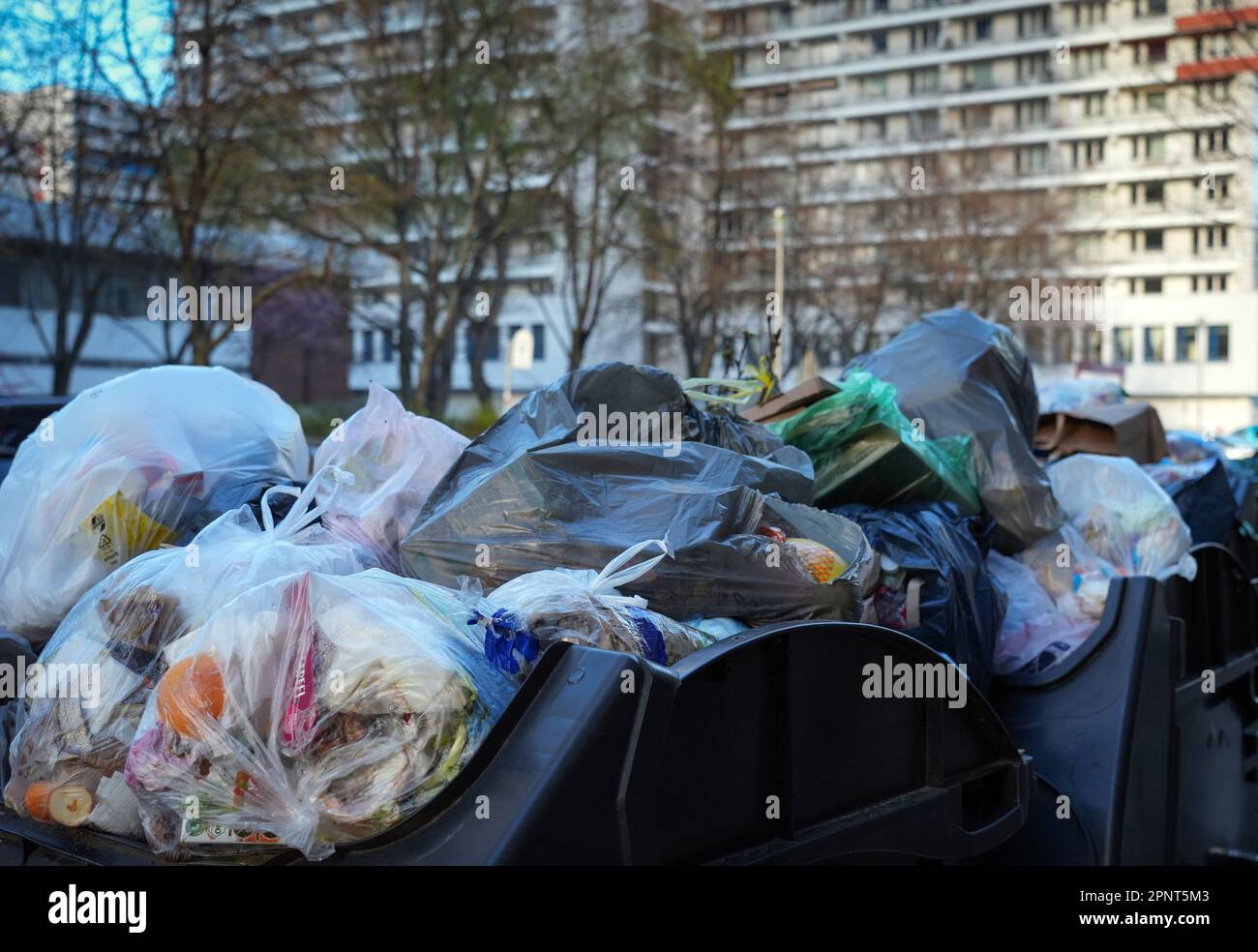 Berlin, Germany. 28th Mar, 2023. Overflowing garbage cans have not been ...