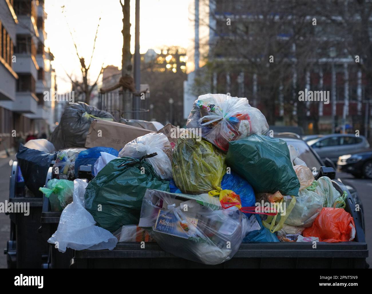 Berlin, Germany. 28th Mar, 2023. Overflowing garbage cans have not been ...