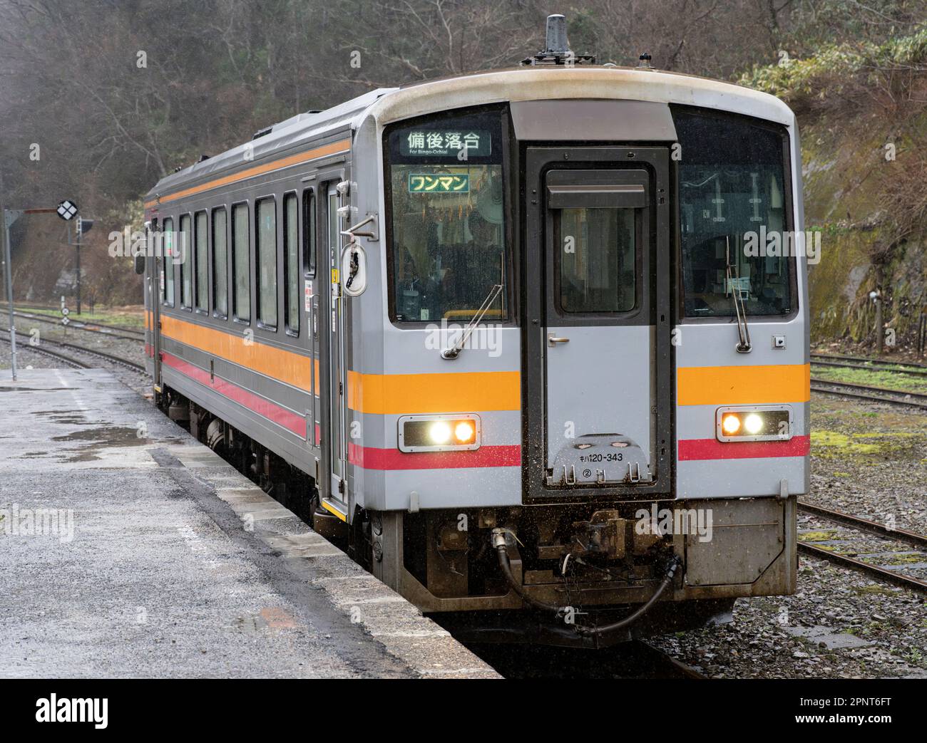A JR West KiHa 120 Series one man train at Bingo-Ochiai Station in ...