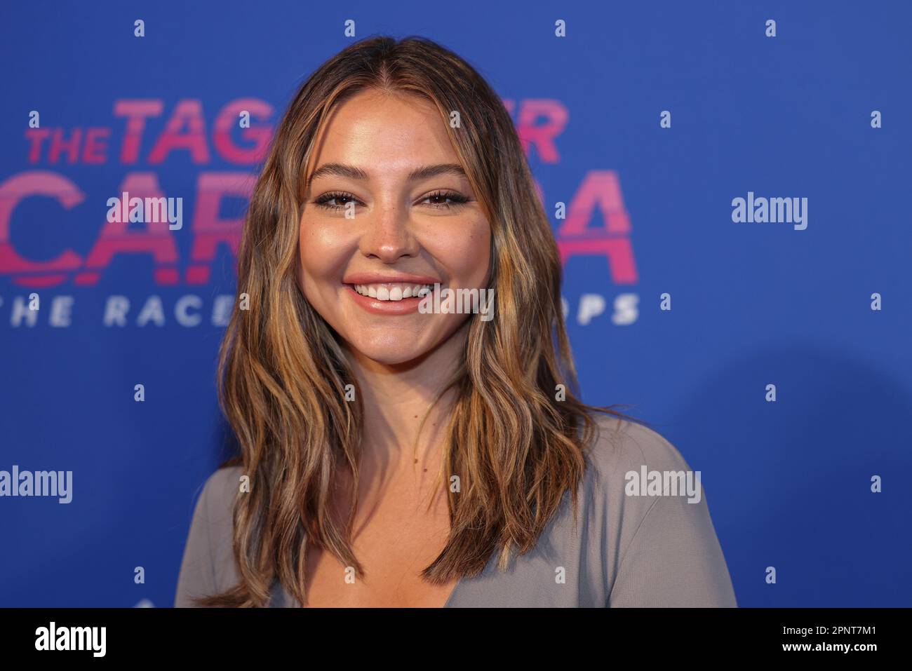 Madelyn Cline poses for photographers upon arrival at the TAG Heuer ...