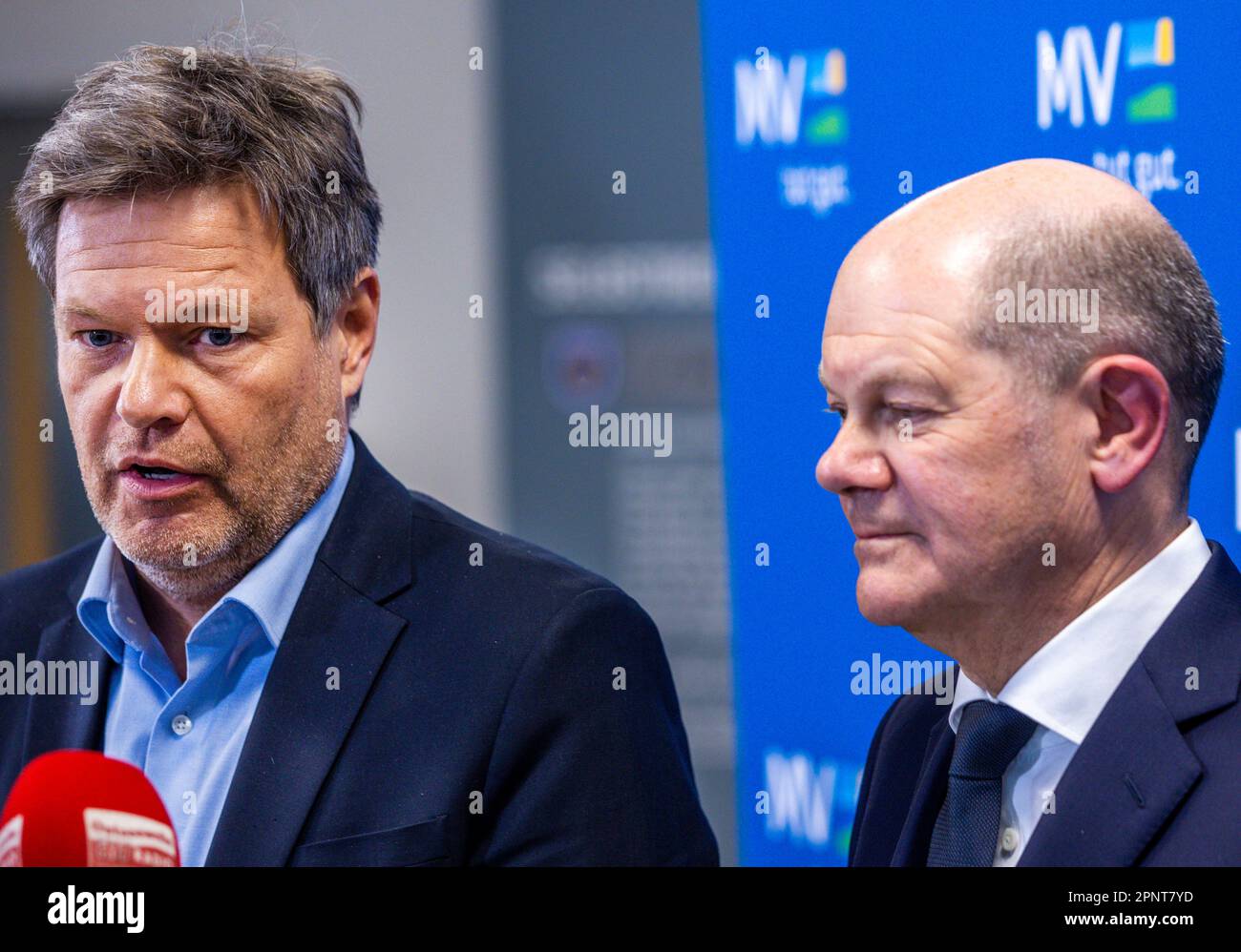 Binz, Germany. 20th Apr, 2023. Chancellor Olaf Scholz (r, SPD) and ...
