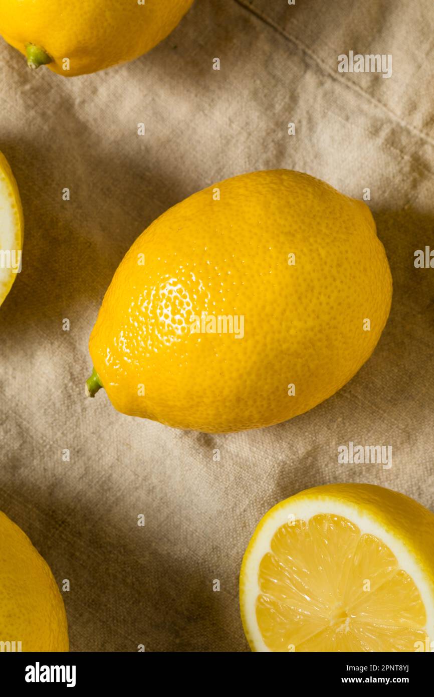 Organic Raw Seedless Yellow Lemons in a Bunch Stock Photo - Alamy