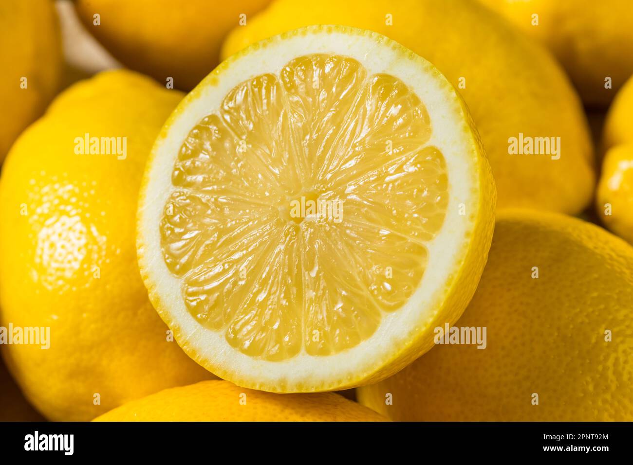 Organic Raw Seedless Yellow Lemons in a Bunch Stock Photo - Alamy