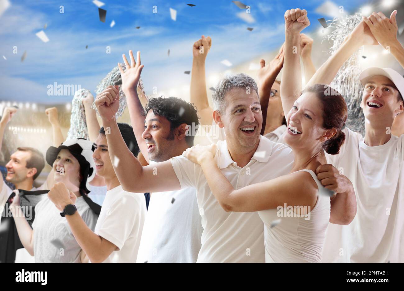 Football supporter on stadium in black and white shirt. Happy fans on ...