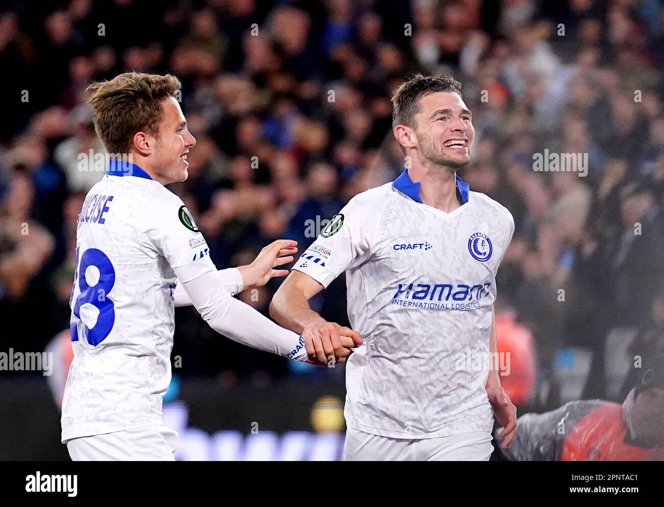 KAA Gent's Hugo Cuypers (right) celebrates scoring their side's first ...