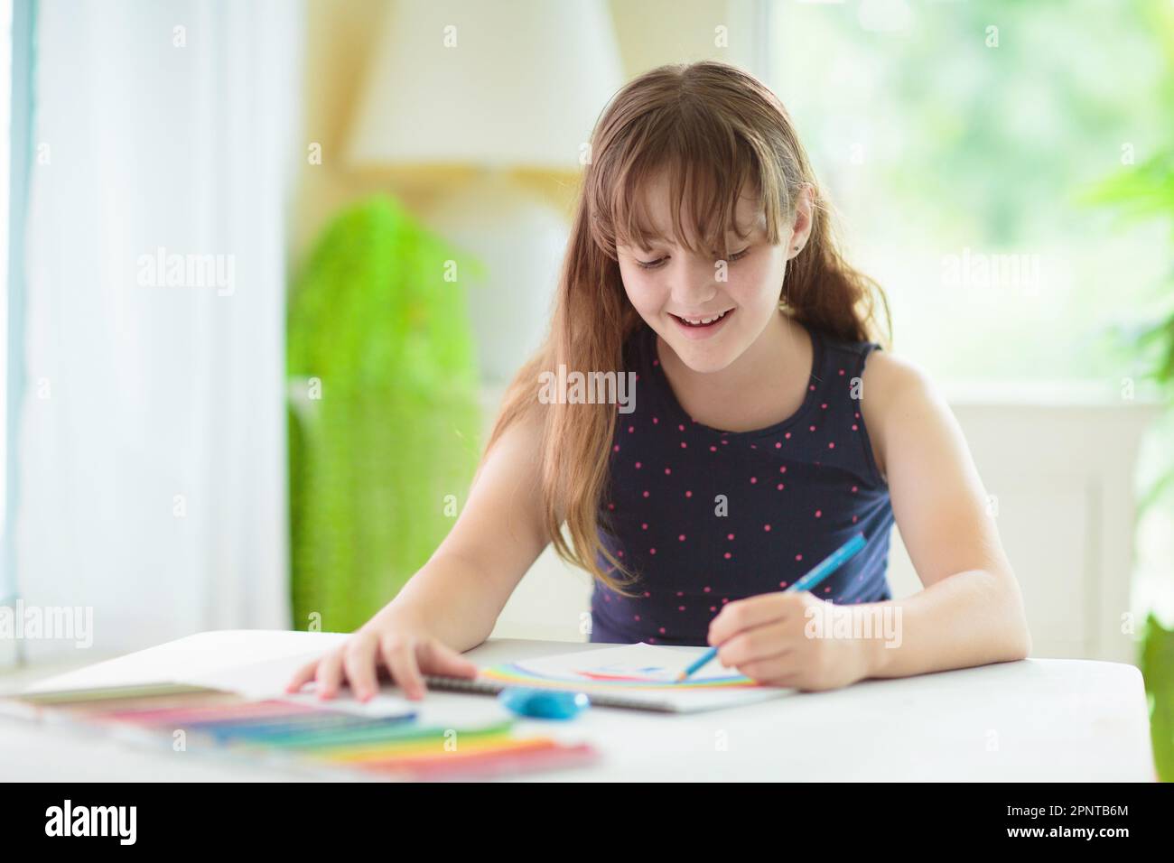 Child drawing. School kid painting a picture. Little boy with colorful ...