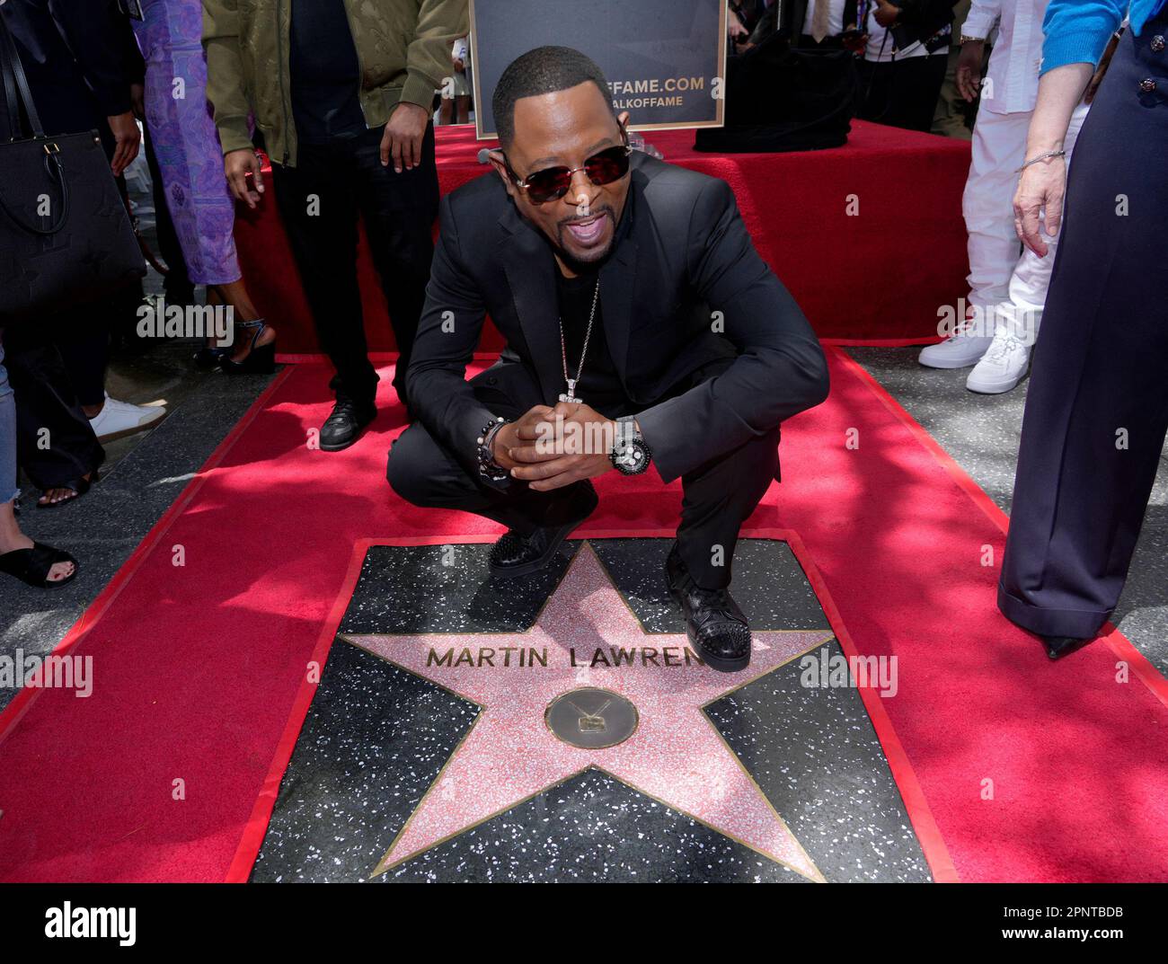 Martin Lawrence poses during a star ceremony in his honor on the ...