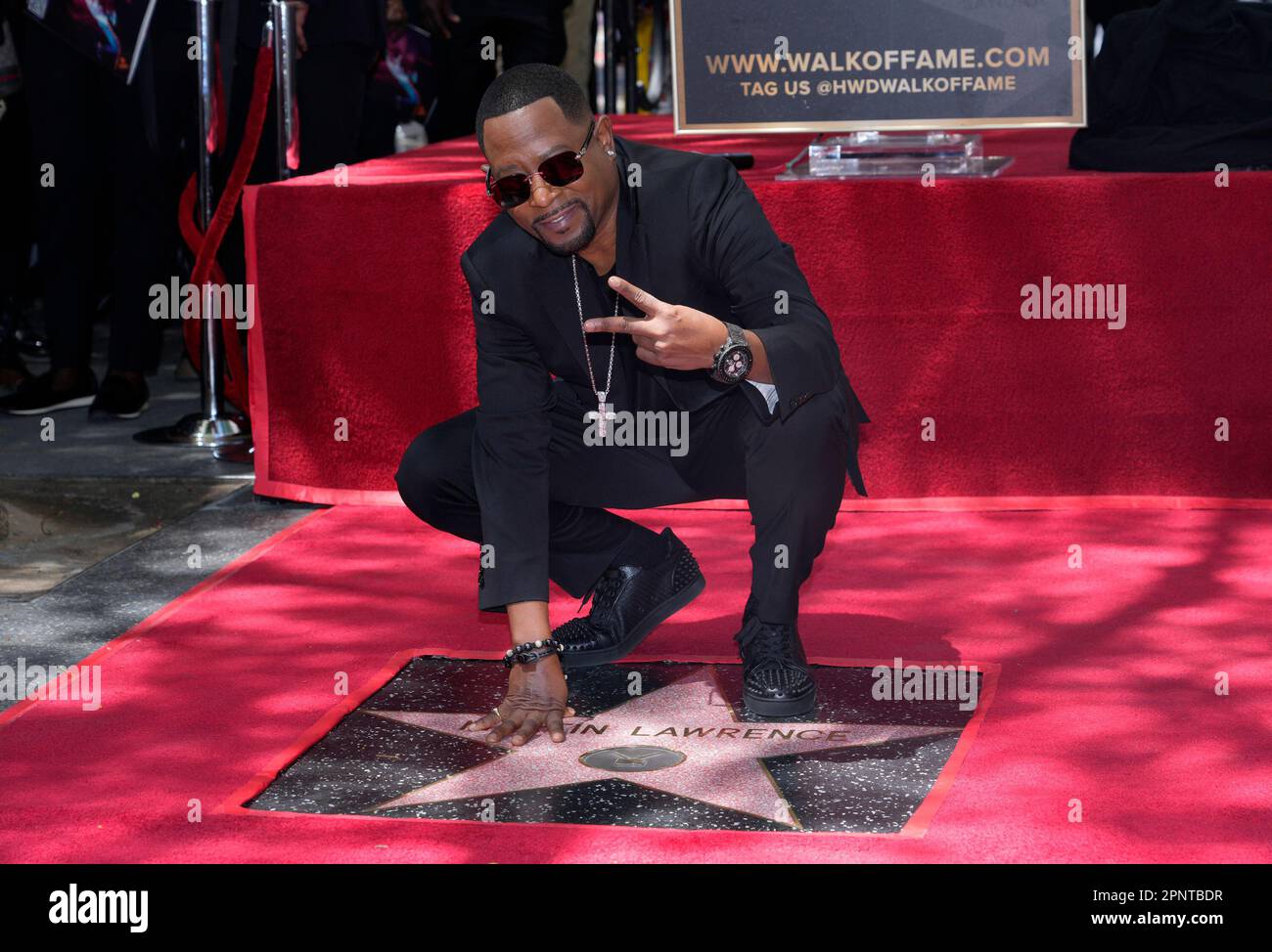 Martin Lawrence poses during a star ceremony in his honor on the ...