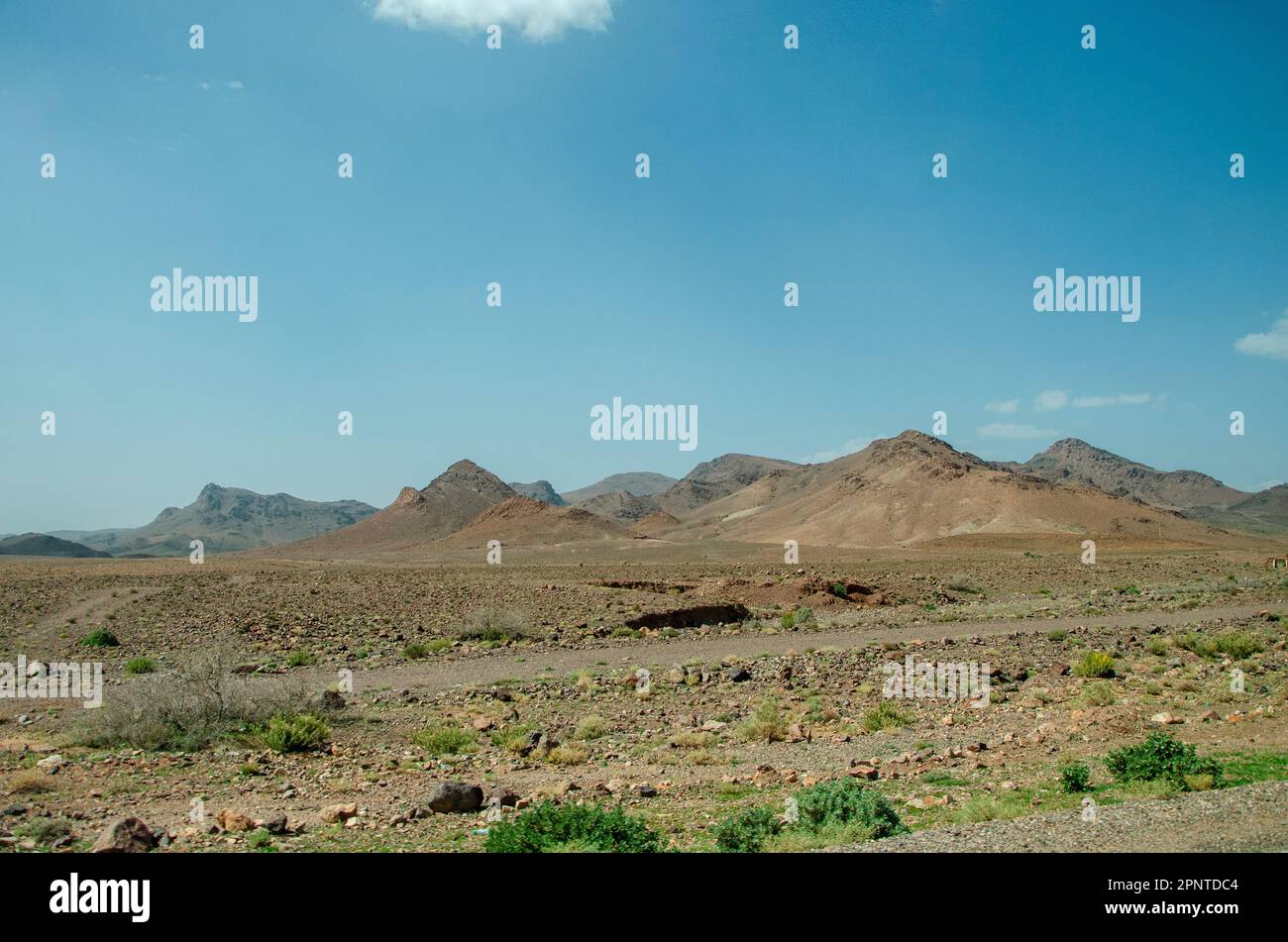 Desert landscapes in Morocco, desolate lands with paths that lead to ...