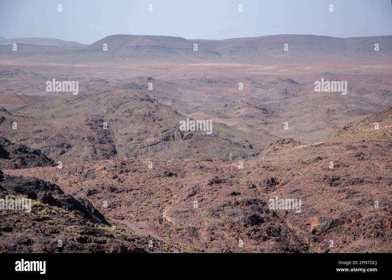 Desert landscapes in Morocco, desolate lands with paths that lead to ...