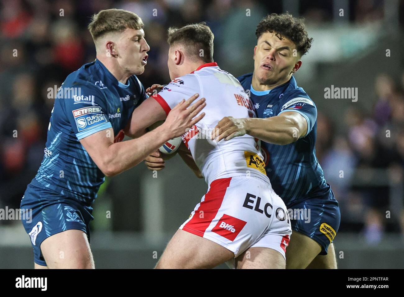 St Helens, UK. 20th Apr, 2023. Jack Welsby #1 of St Helens is tackled ...