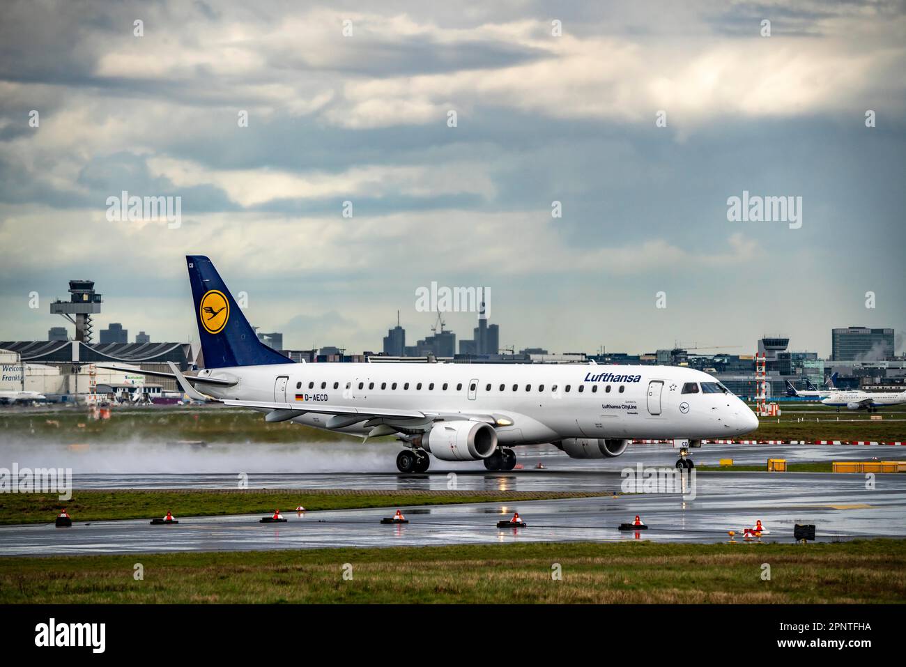 Lufthansa Embraer ERJ-190, D-ACMF, takes off on Runway West, skyline of ...