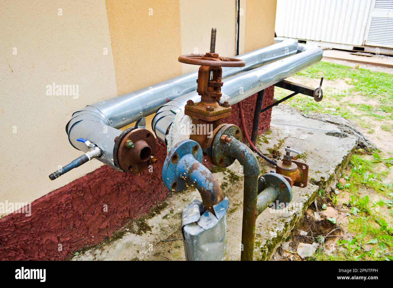 Iron old rusty corrosion-proof industrial metal pipes with flanges ...