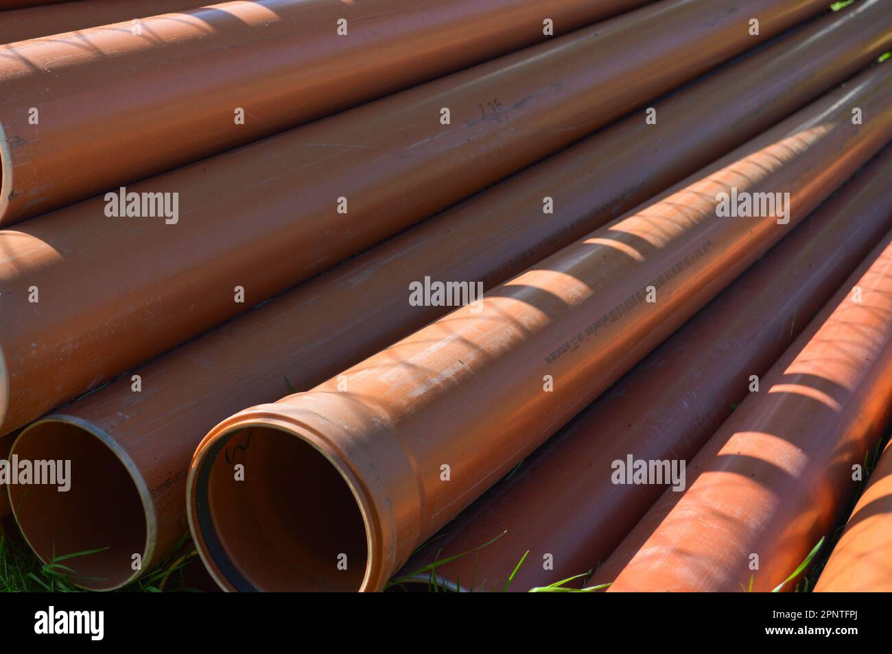 Orange plastic industrial polypropylene thick plumbing pipes with large ...