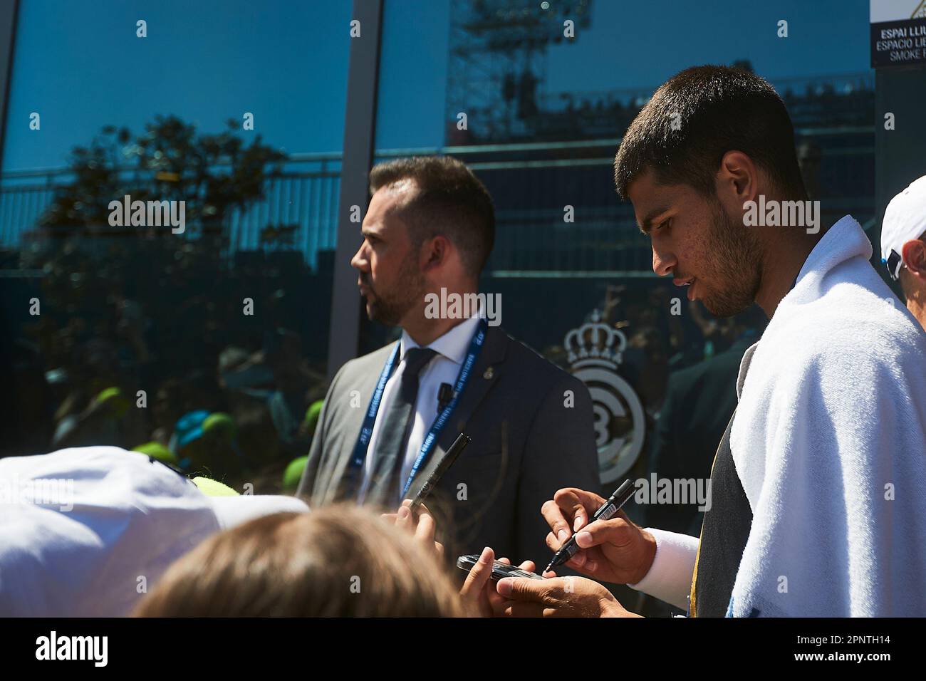 BARCELONA, SPAIN - APRIL 20: Carlos Alcaraz signs memorabilia for fans ...