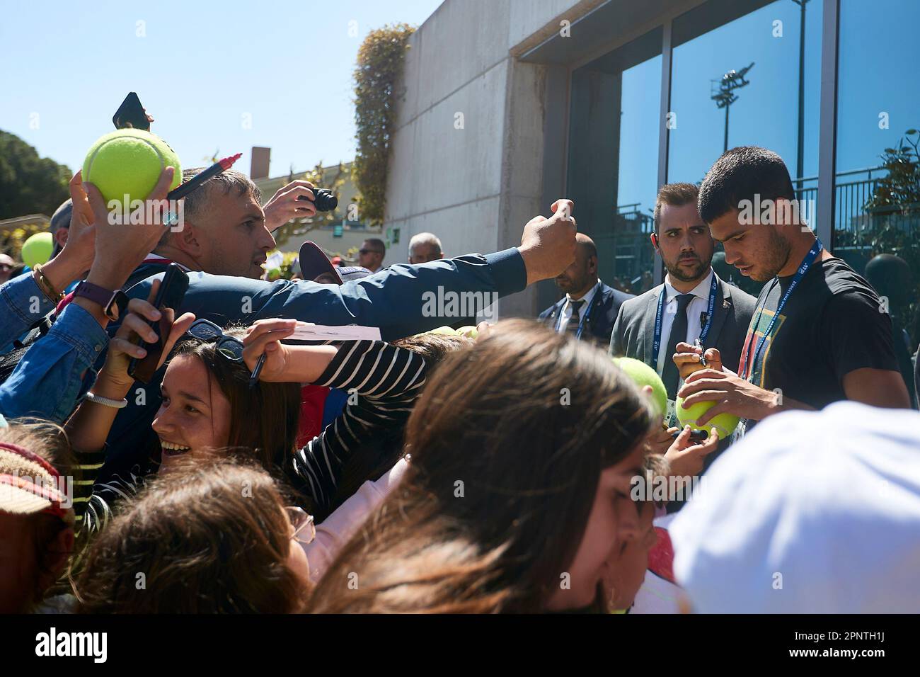 BARCELONA, SPAIN - APRIL 20: Carlos Alcaraz signs memorabilia for fans ...