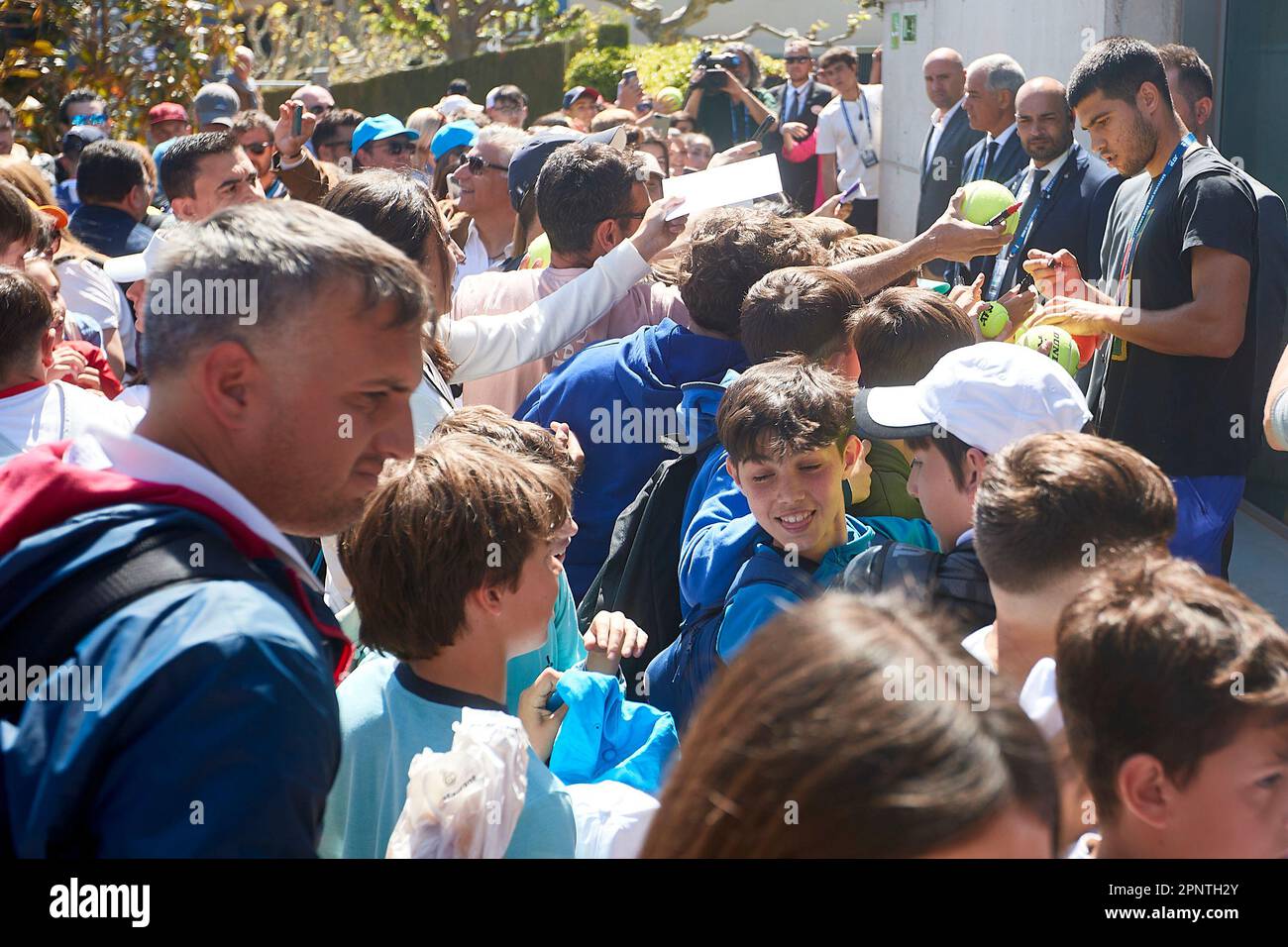 BARCELONA, SPAIN - APRIL 20: Carlos Alcaraz signs memorabilia for fans ...