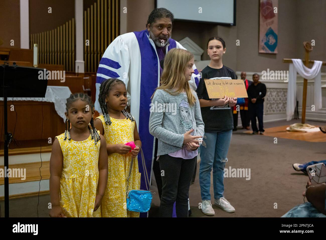 Bishop William Barber and a group of children inside the Mckendree United Methodist Church prior ...