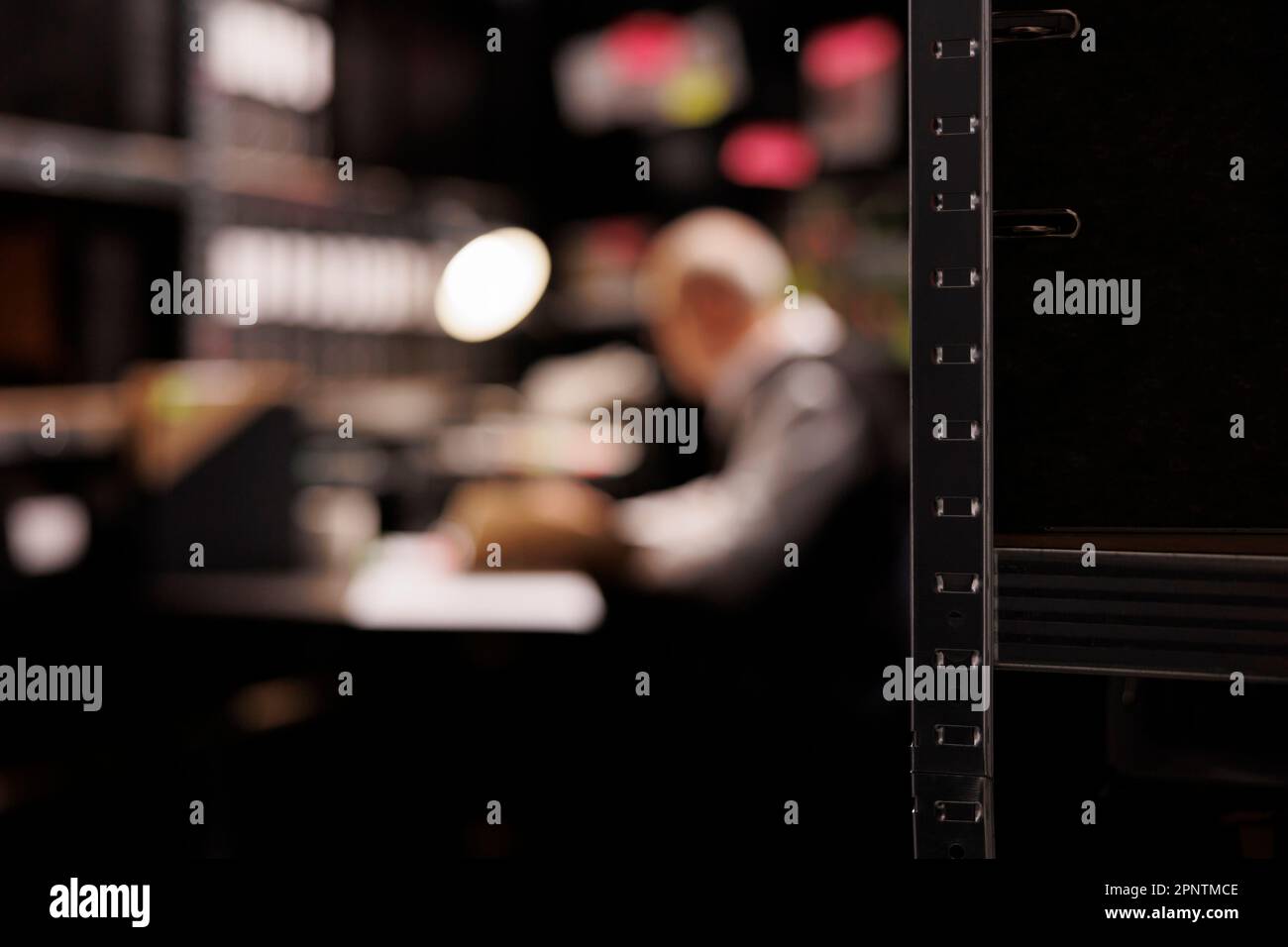 Evidence room equipped with metallic shelves full with federal ...